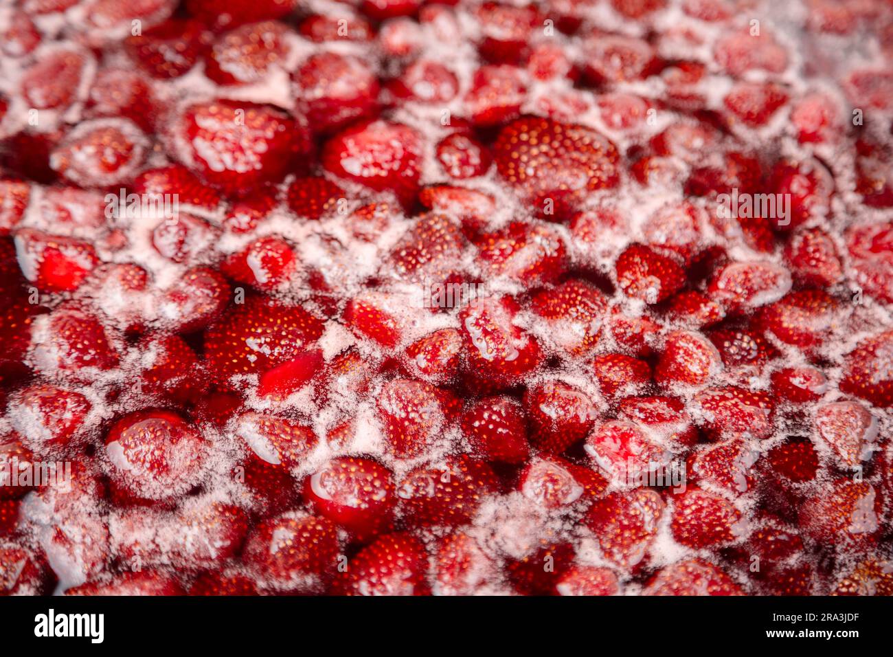 Strawberry jam, top view. Homemade Strawberry jam in making progress ...