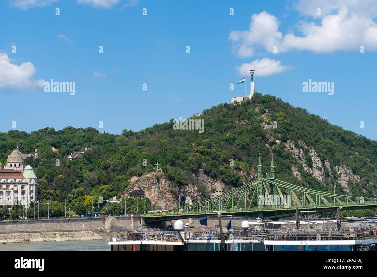 Liberty bridge or Freedom bridge over the Danube river. Gellért Hill ...