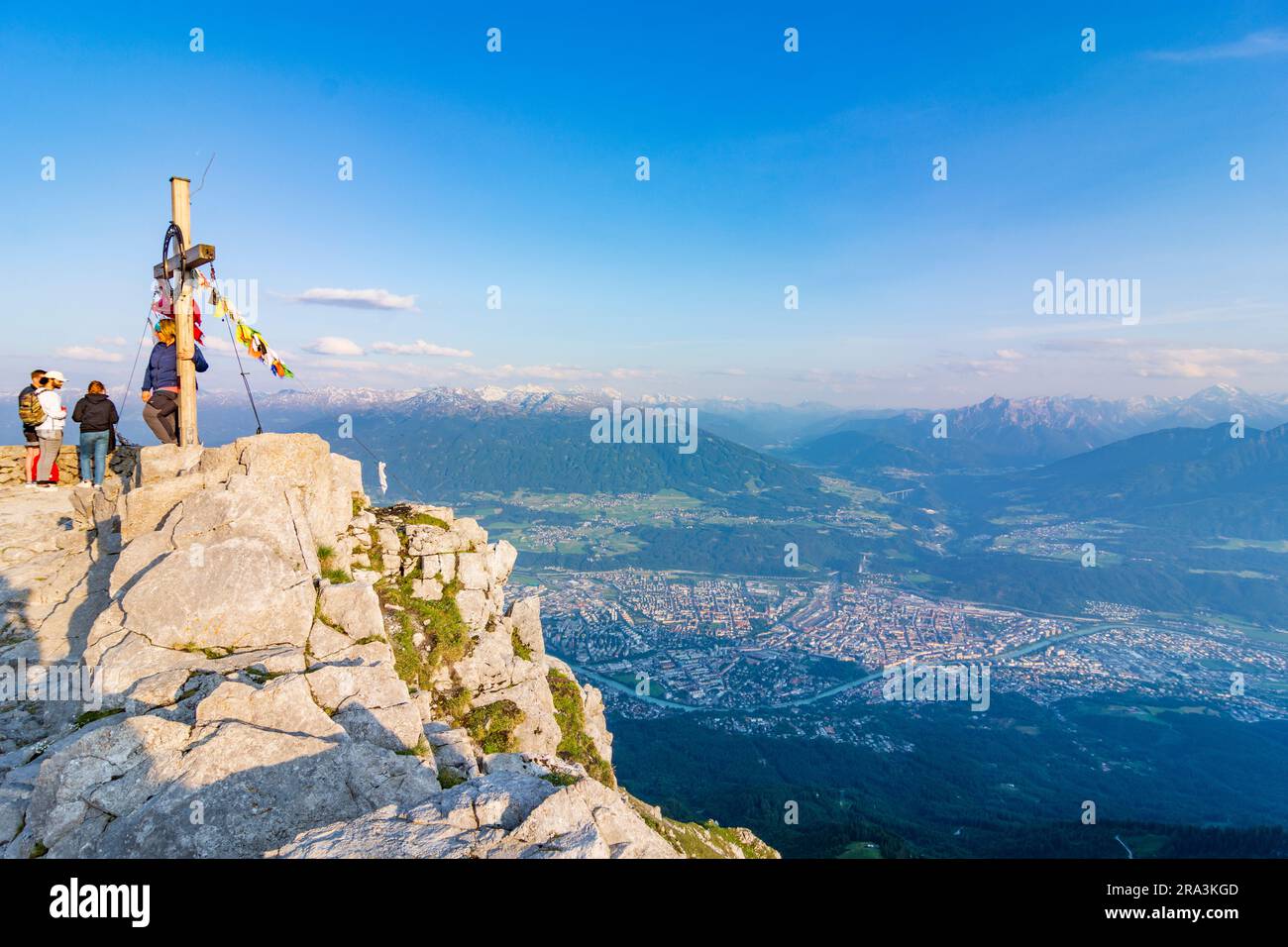 Innsbruck: summit cross on summit Hafelekarspitze, mountain range ...