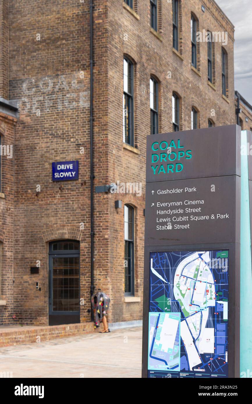 Coal Drops Yard buildings and sign at shopping complex part of Kings ...
