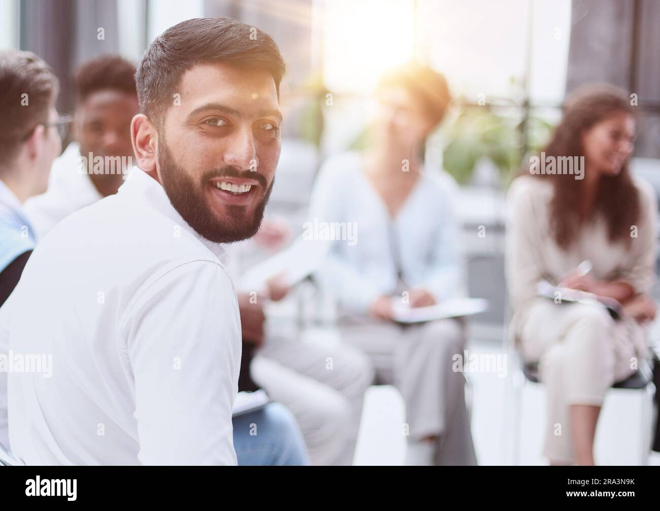 Large group of business people in presentation Stock Photo - Alamy