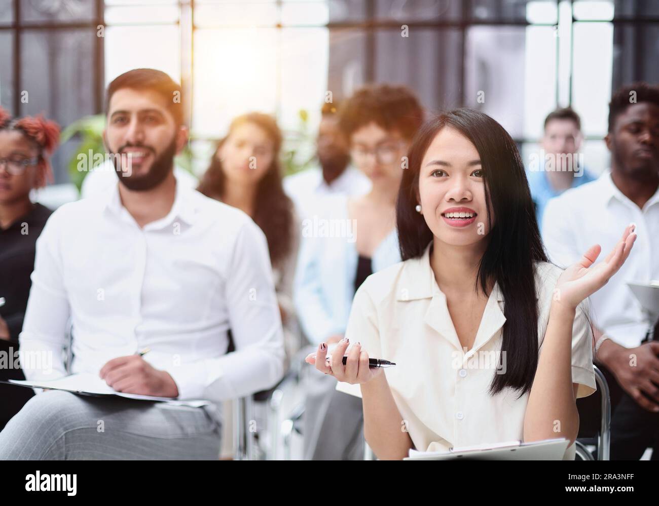 close up. a group of corporate employees showing their unity Stock ...