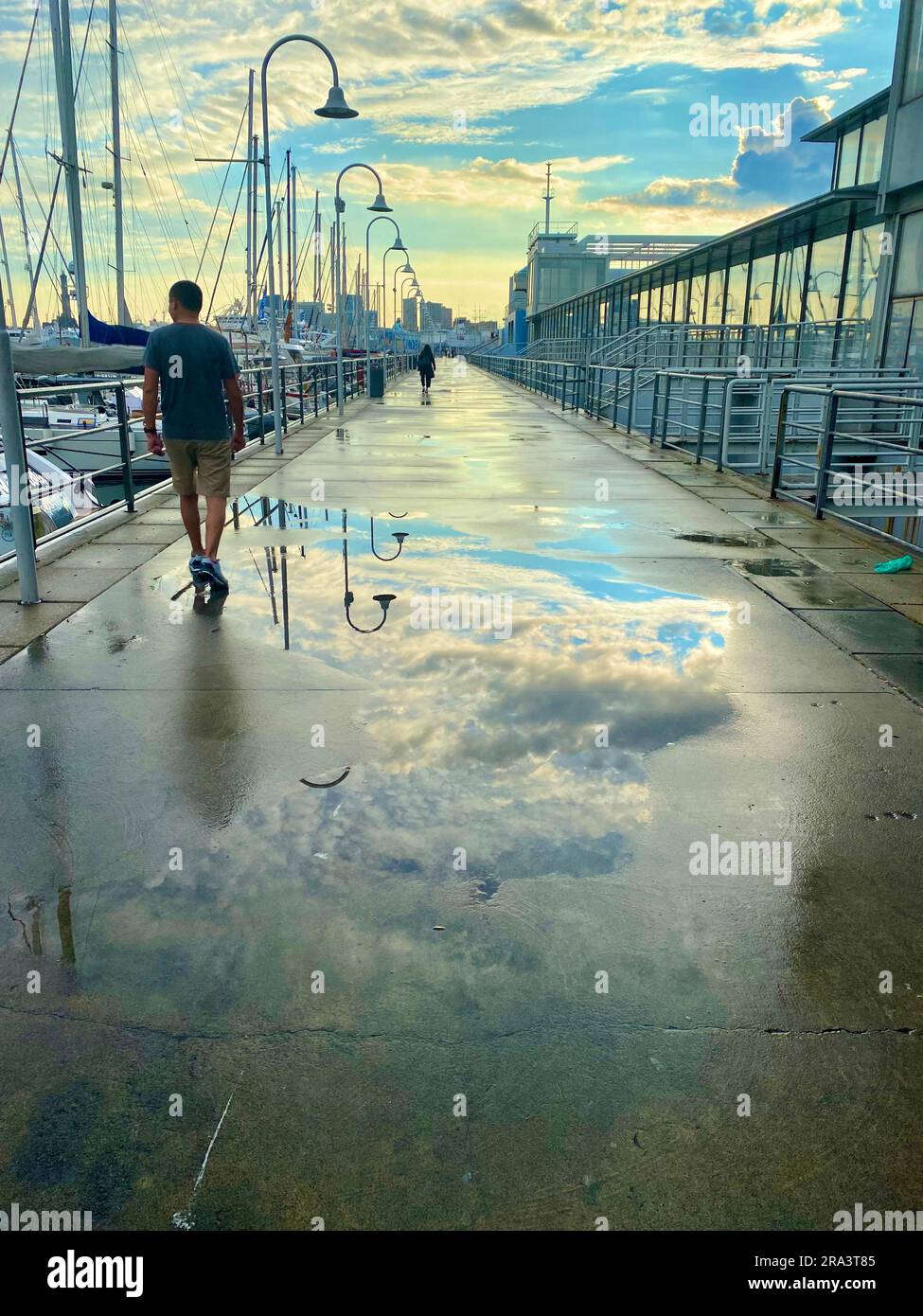 Reflection of the sky in a puddle Stock Photo - Alamy