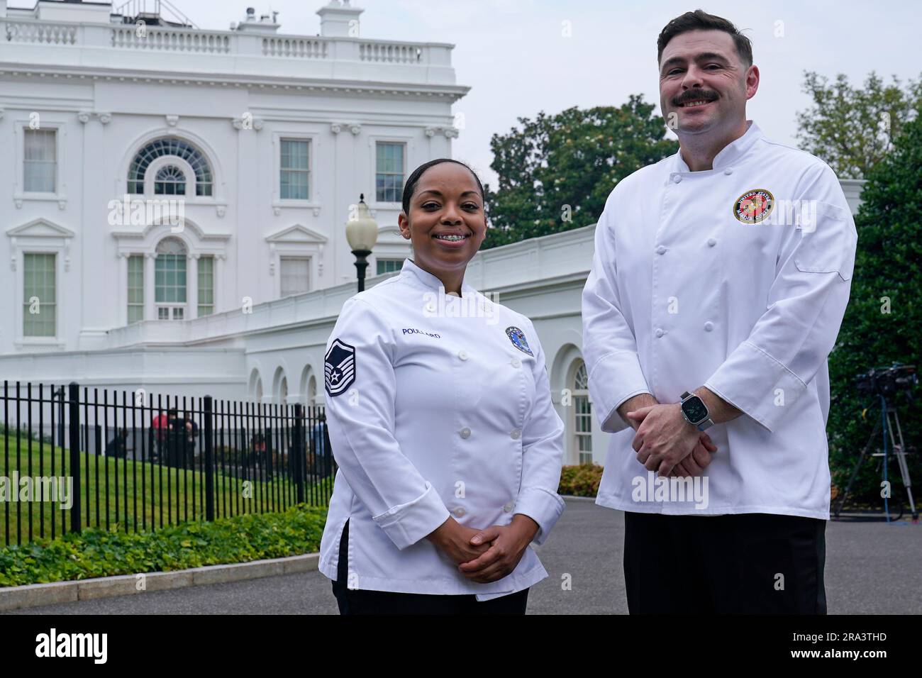 Air Force Master Sgt. and chef Opal Poullard, left, and Marine Corps ...