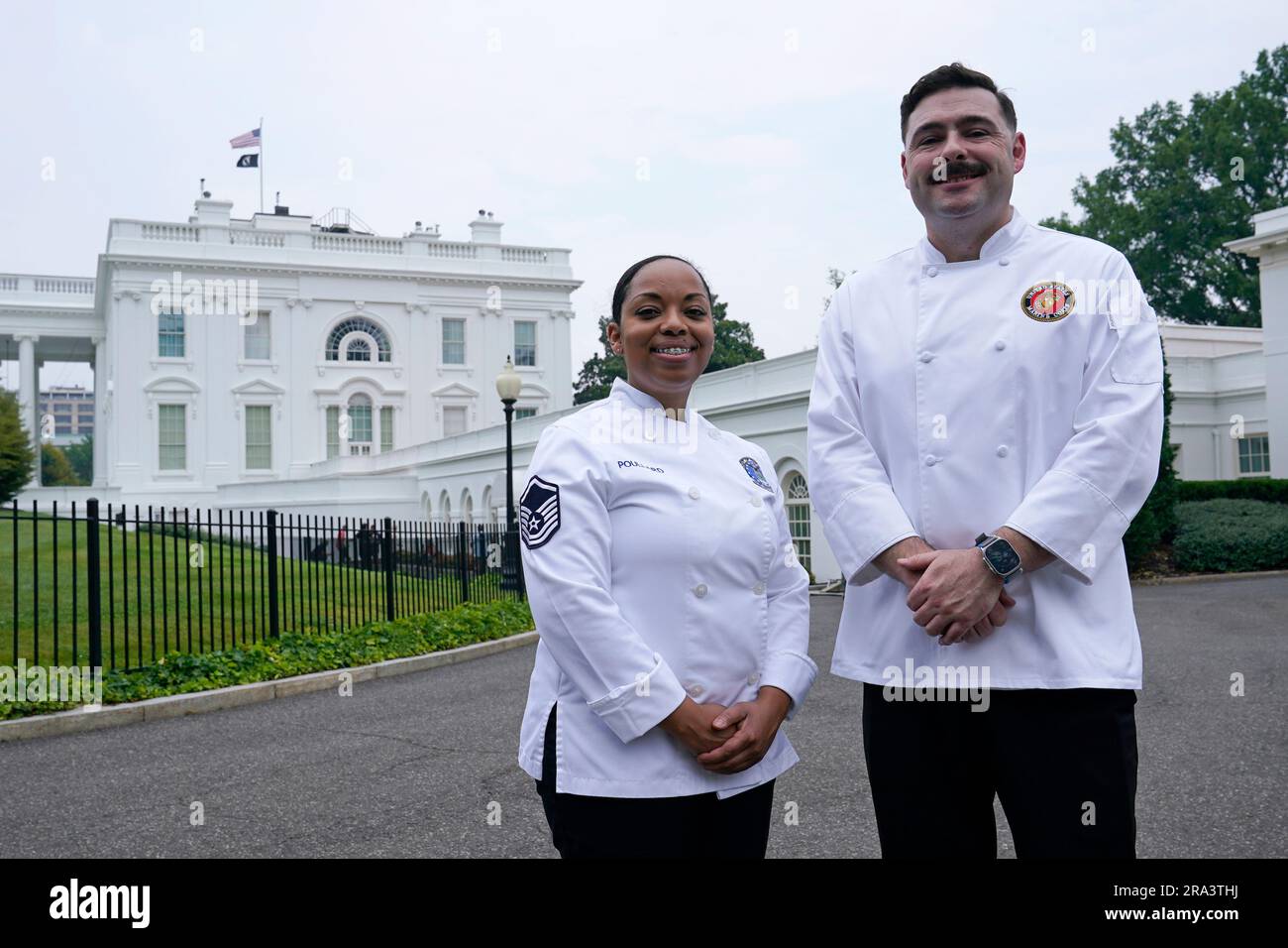 Air Force Master Sgt. and chef Opal Poullard, left, and Marine Corps ...