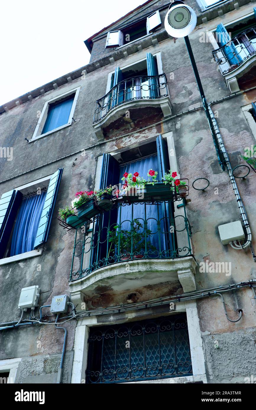 building with flowers in Venice, Italy Stock Photo - Alamy