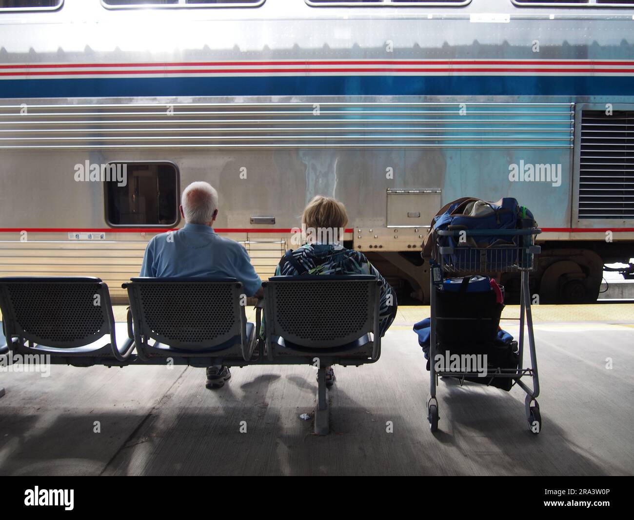 Couple waits to board the Amtrak Auto-Train on the platform at the ...