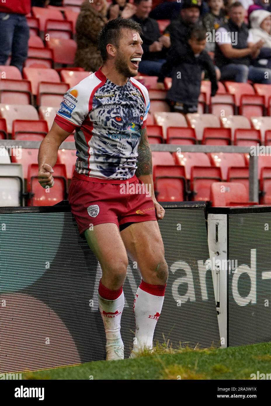 Leigh Leopards' Tom Briscoe celebrates after scoring a try during the ...
