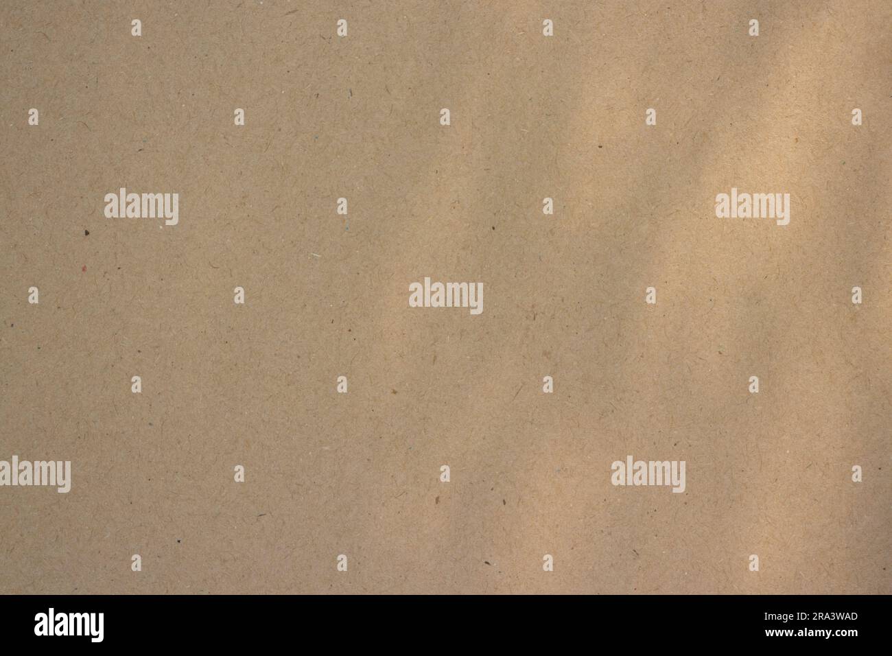 light brown paper as background in daylight Stock Photo - Alamy