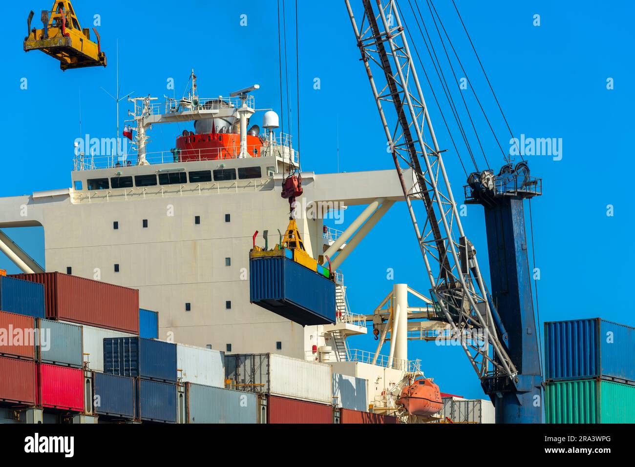 Cargo ship being loaded at the port of Iquique, Chile Stock Photo - Alamy