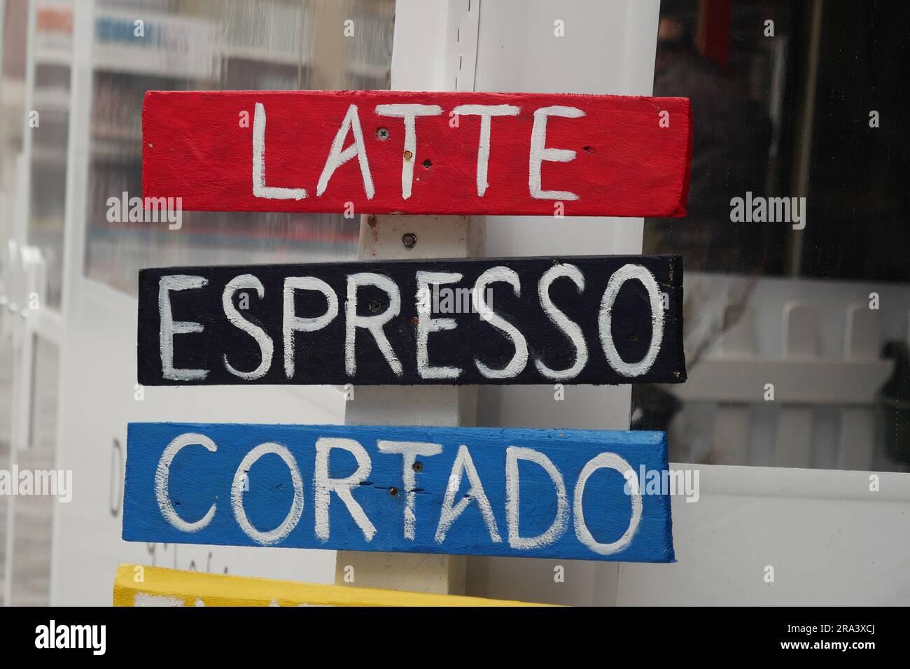 A sign at a coffee shop offering different types of coffee Stock Photo ...