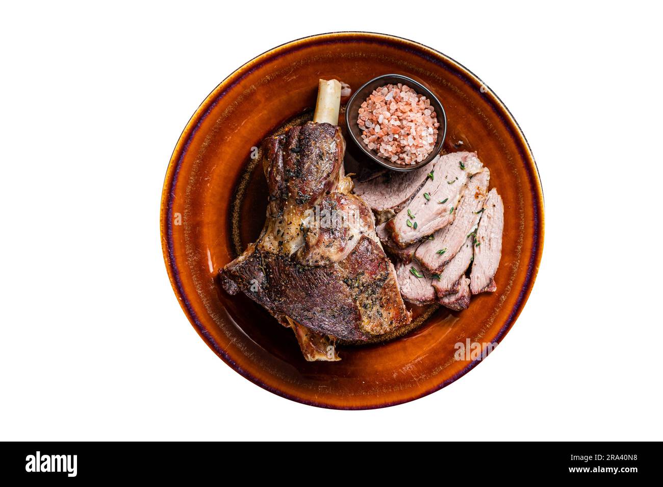 BBQ Roast Lamb mutton leg sliced on a rustic plate. High quality ...