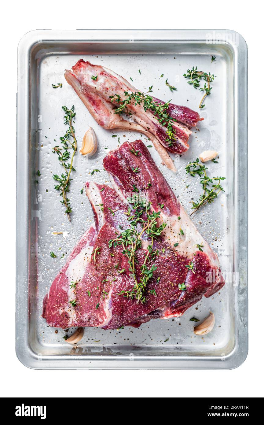 Cooking of Raw lamb mutton leg with thyme, pepper and olive oil in ...