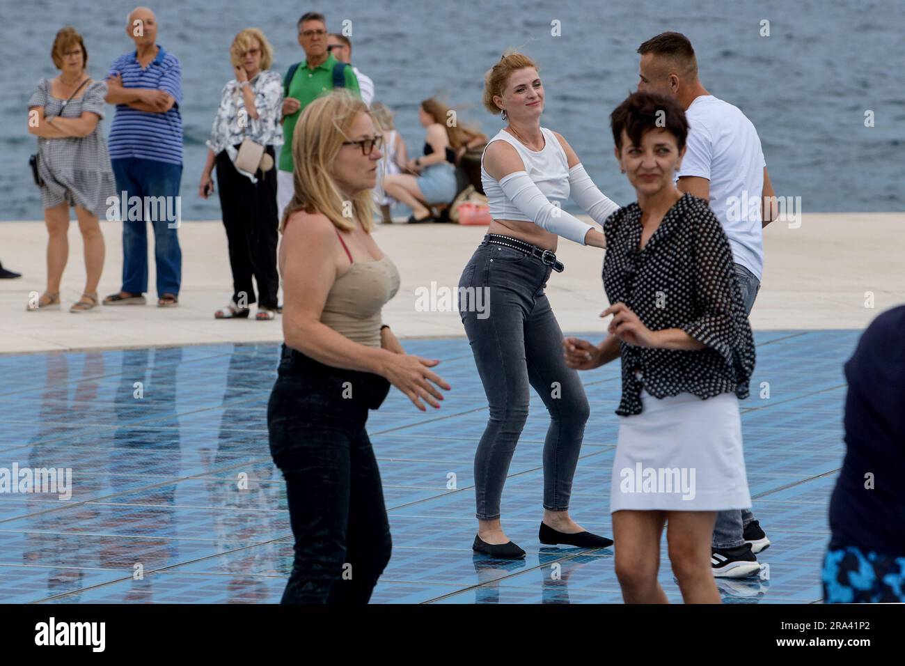 Zadar, Croatia. 30th June, 2023. Couples dance at Monument to the Sun ...