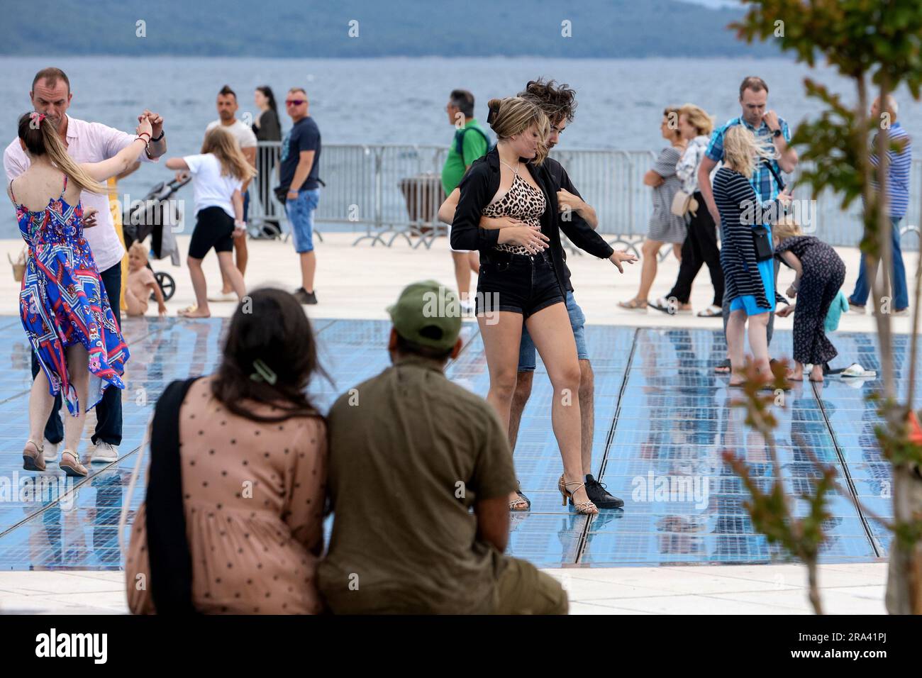 Zadar, Croatia. 30th June, 2023. Couples dance at Monument to the Sun ...