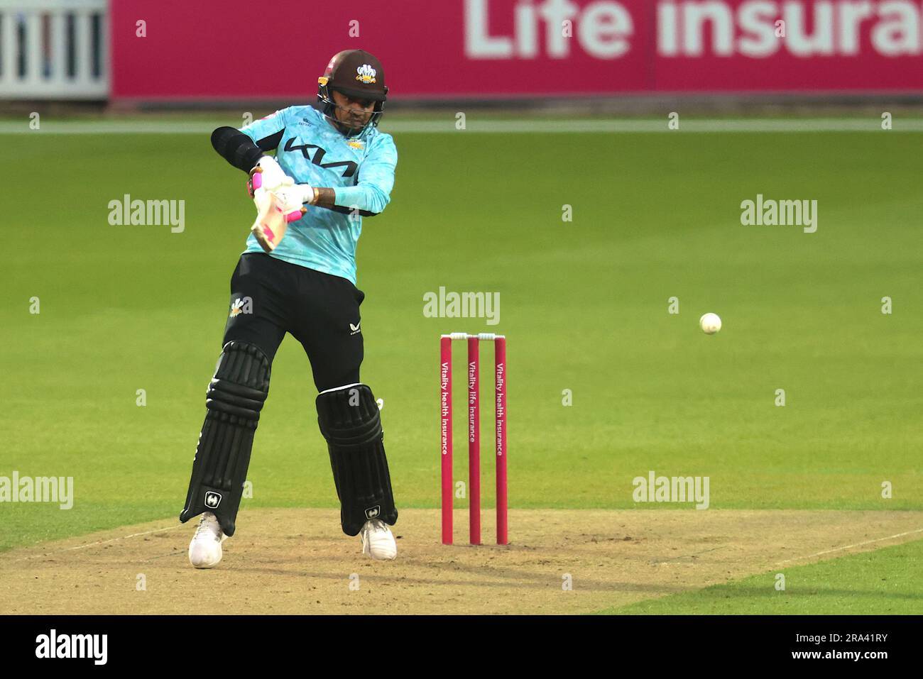 London, UK. 30th June, 2023. Surrey's Sunil Narine smashes a four as ...