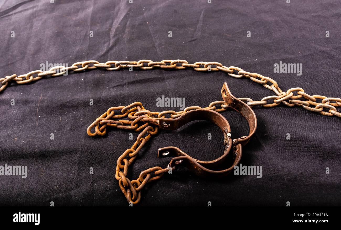 Old chains or handcuffs used to hold prisoners or slaves between 1600 ...