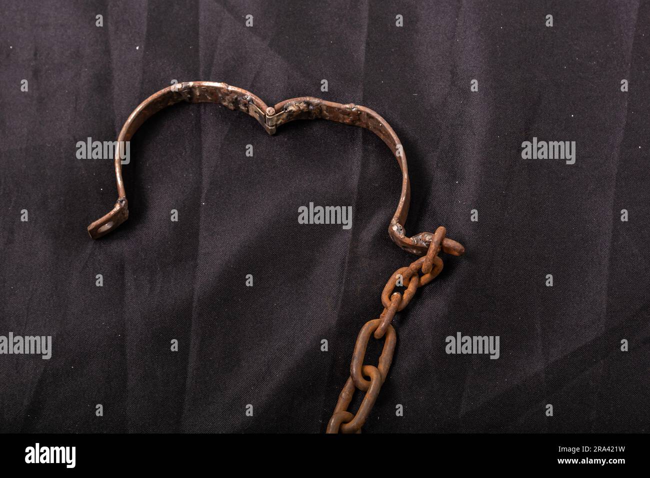 Old chains or handcuffs used to hold prisoners or slaves between 1600 ...