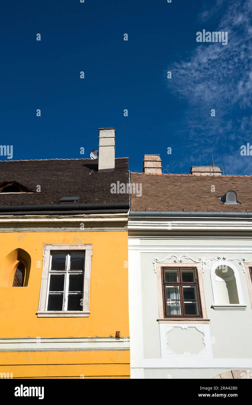 Adjoined old houses facade detail Stock Photo - Alamy