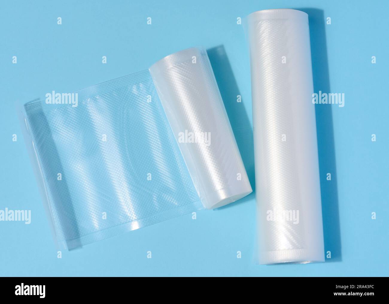 Rolls with plastic film for vacuum packaging of products, hermetic ...
