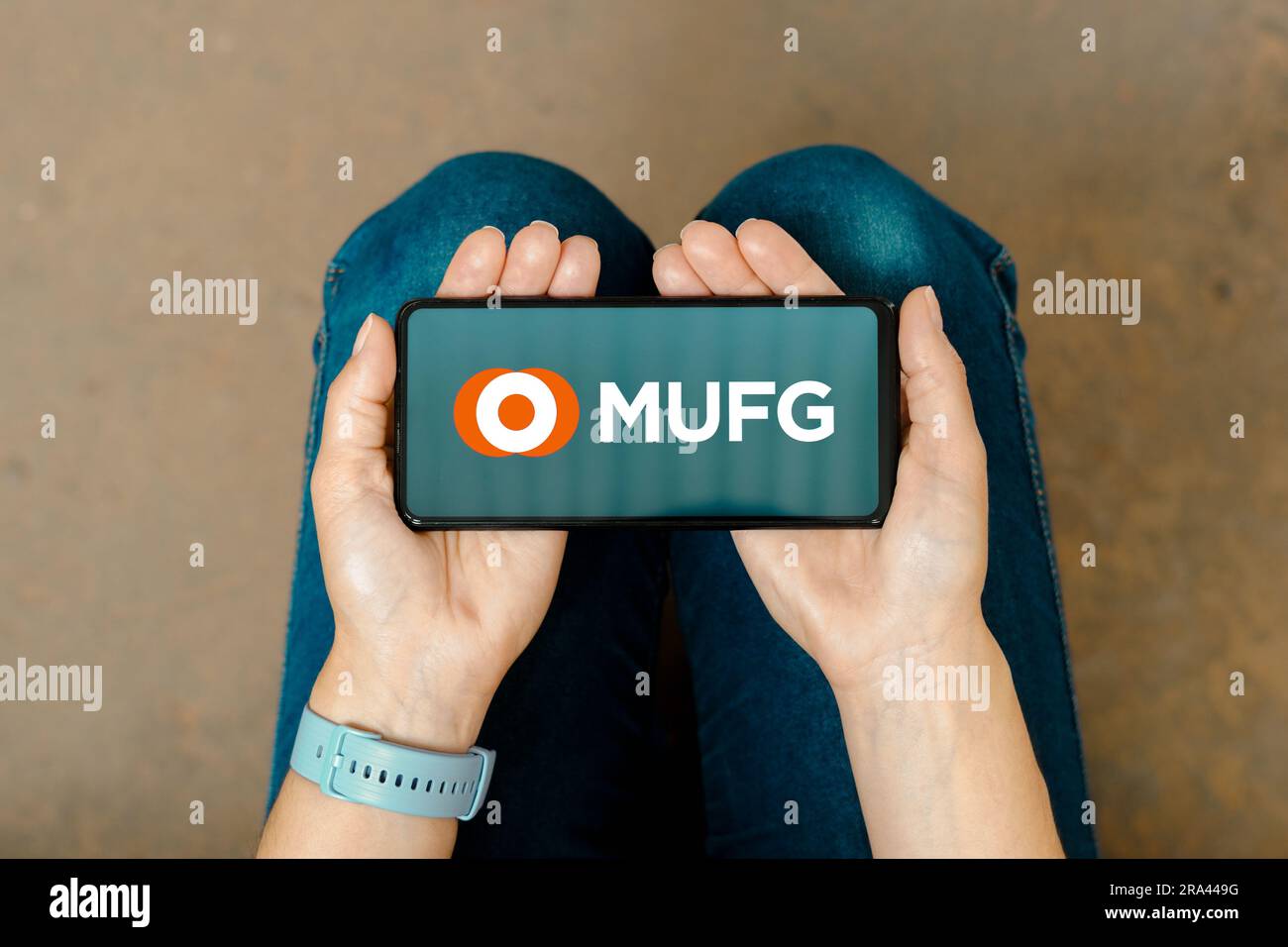 In this photo illustration, the MUFG (Mitsubishi UFJ Financial Group) logo is displayed on a ...