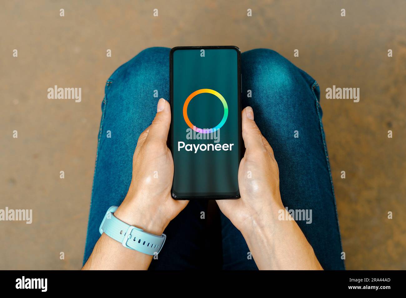 In this photo illustration, the Payoneer logo is displayed on a ...