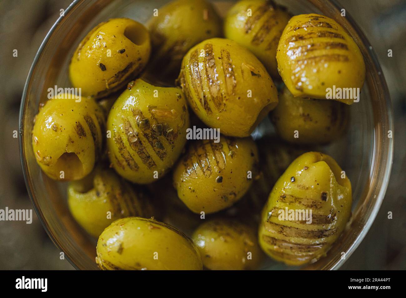green grilled greek olives Stock Photo - Alamy
