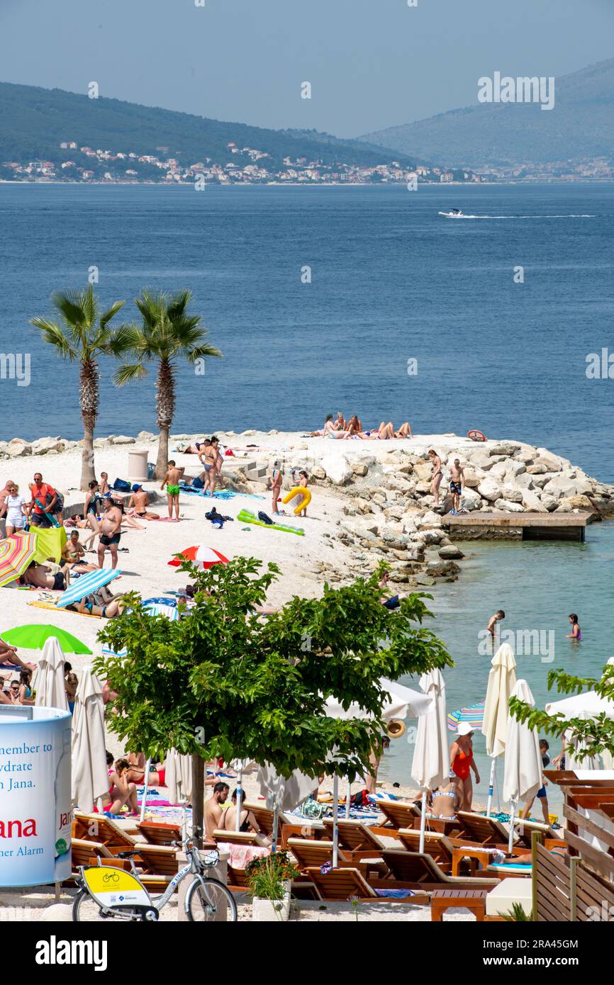 tourists beach in split, croatia Stock Photo - Alamy