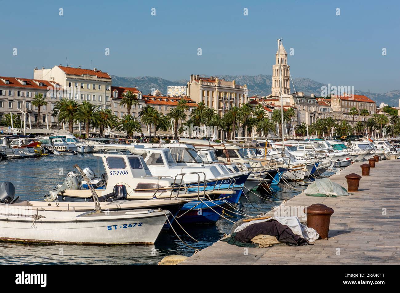 boats moored on pontoons in the harbour of grad split in croatia. view ...