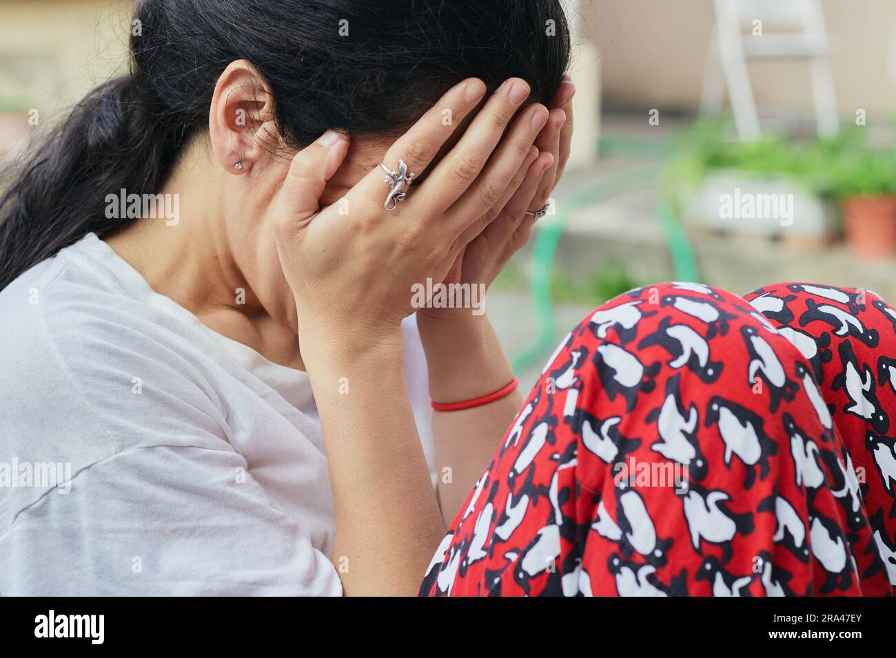 Arms covering face hi-res stock photography and images - Alamy