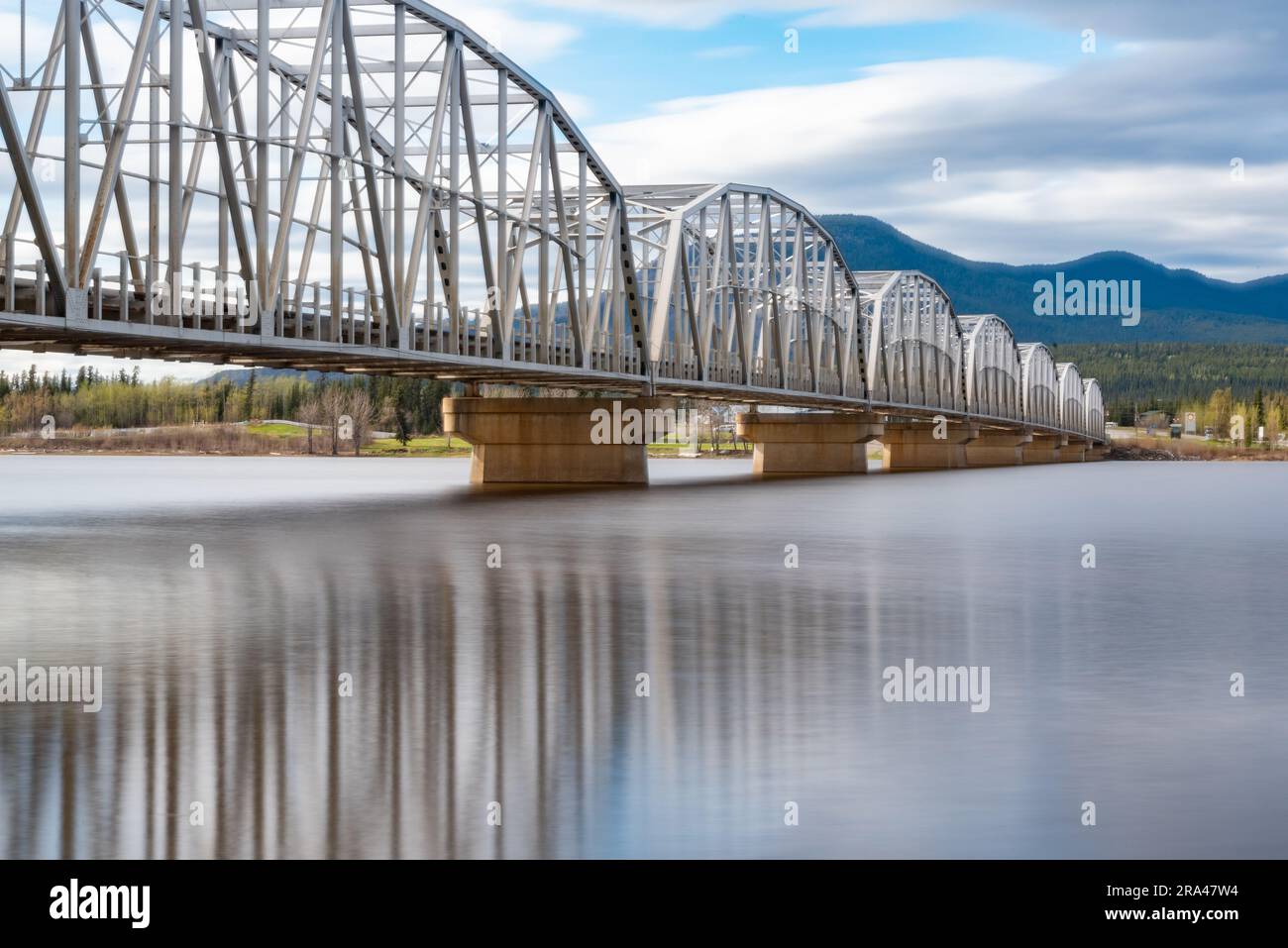 Large man made structure steel bridge spanning across Nisutlin Bay in ...
