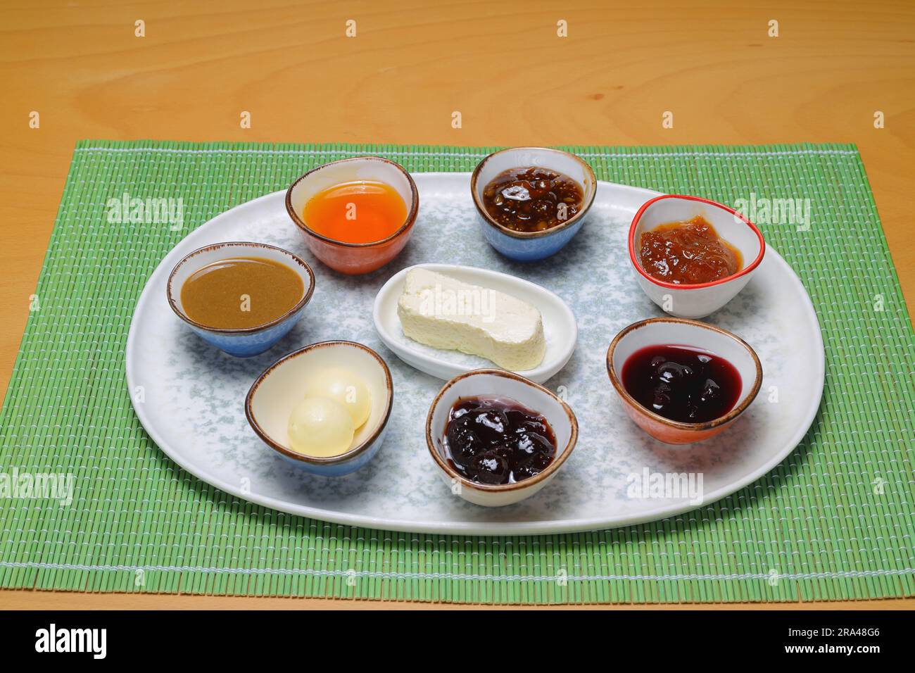 Turkish breakfast table. Pastries, vegetables, greens, olives, cheeses ...