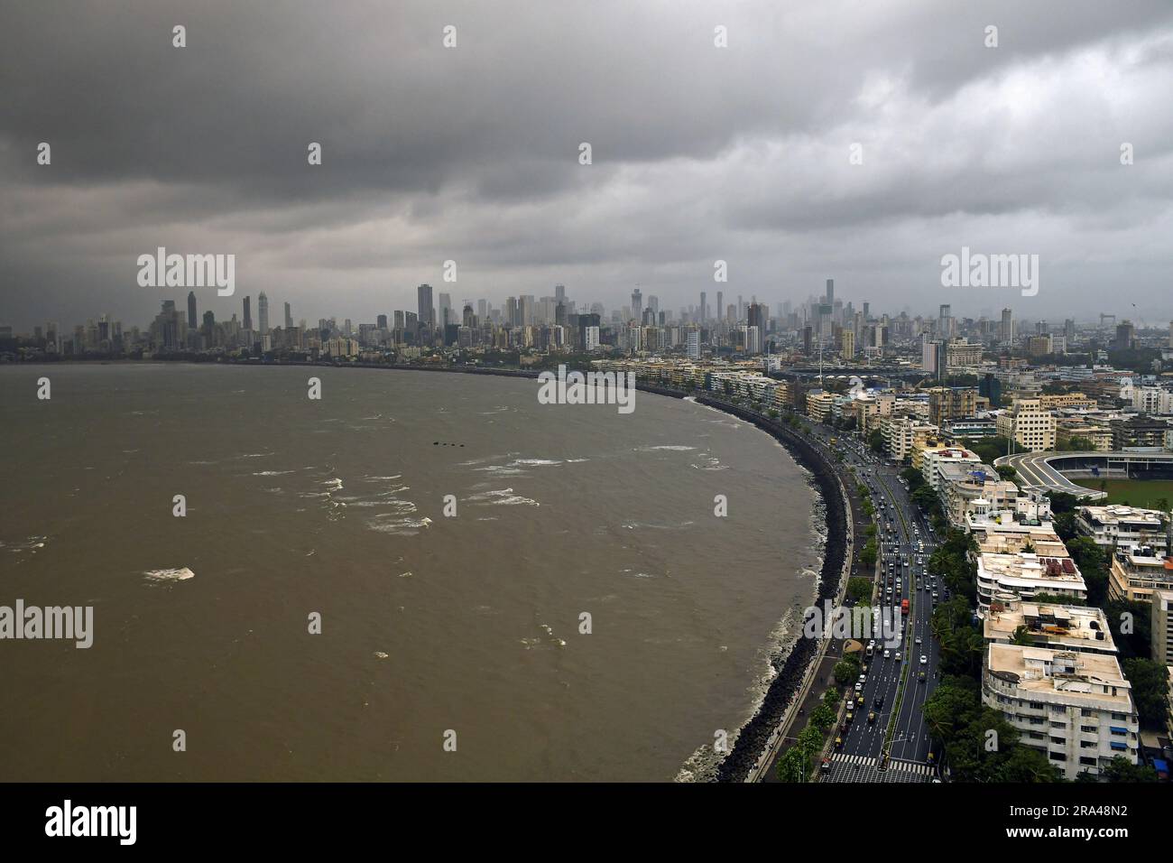 Monsoon clouds gather in the sky across Marine Drive in Mumbai. Marine ...
