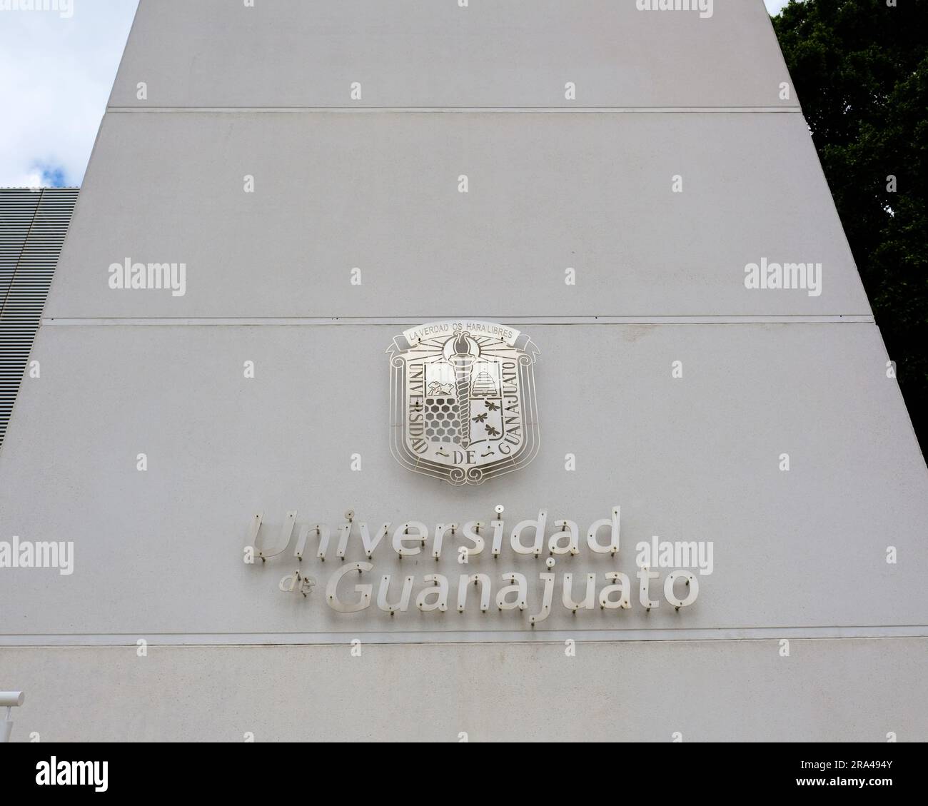 Universidad de Guanajuato, seal and name on a wall at the Leon Campus ...