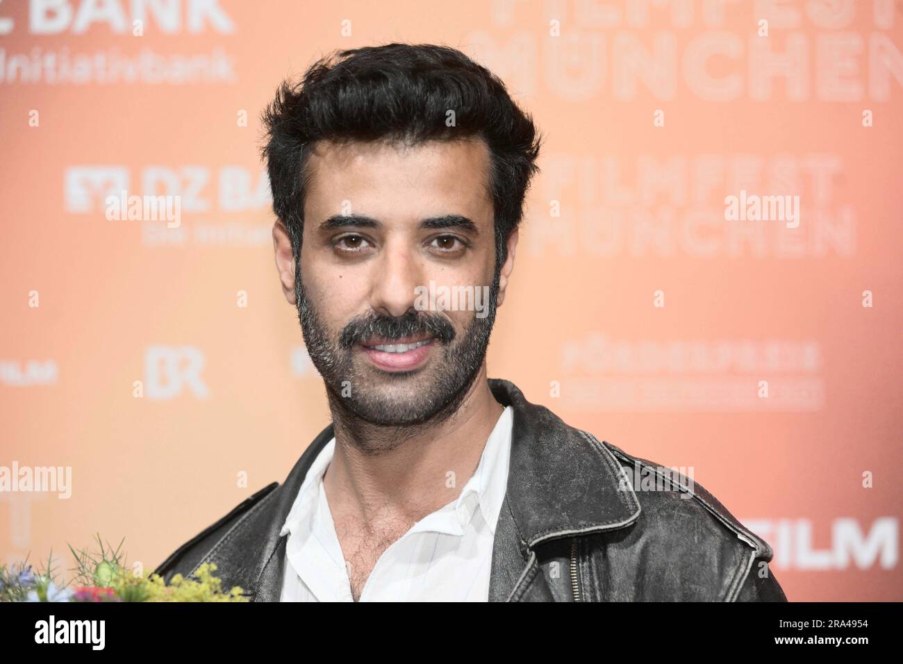 Munich, Germany. 30th June, 2023. Actor Dor Aloni stands on the red ...