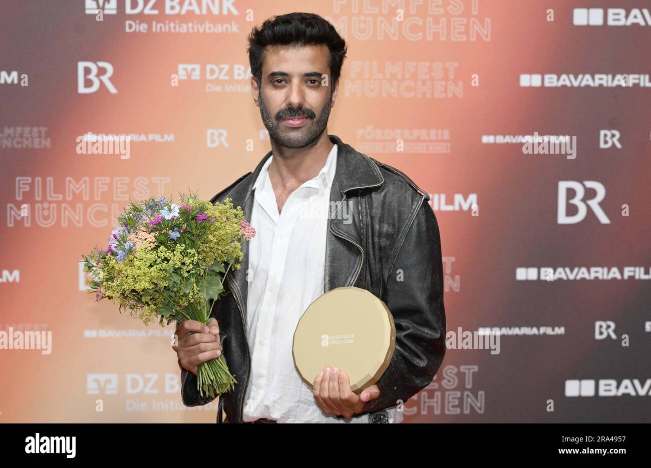 Munich, Germany. 30th June, 2023. Actor Dor Aloni stands on the red ...