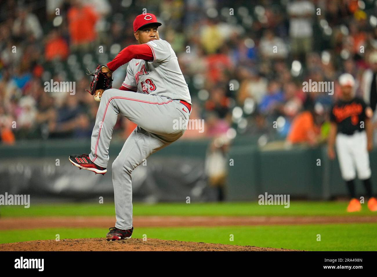 Cincinnati Reds relief pitcher Alexis Diaz throws a pitch in the ninth ...
