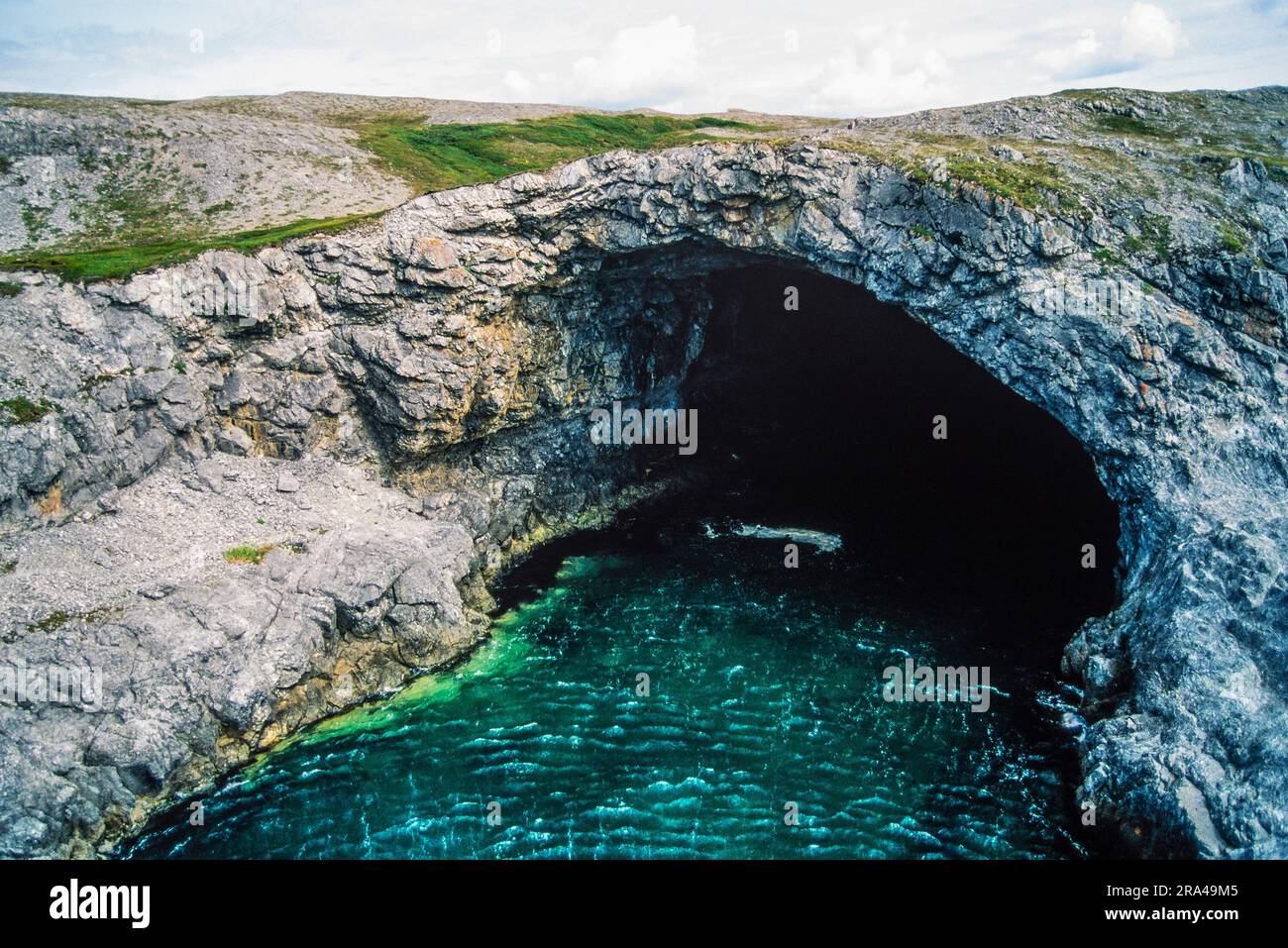 Aerial image of sea cave near Raleigh, Newfoundland, Canada Stock Photo ...