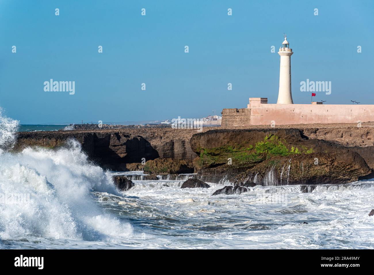 The lighthouse of Rabat during stormy sea, Morocco Stock Photo - Alamy