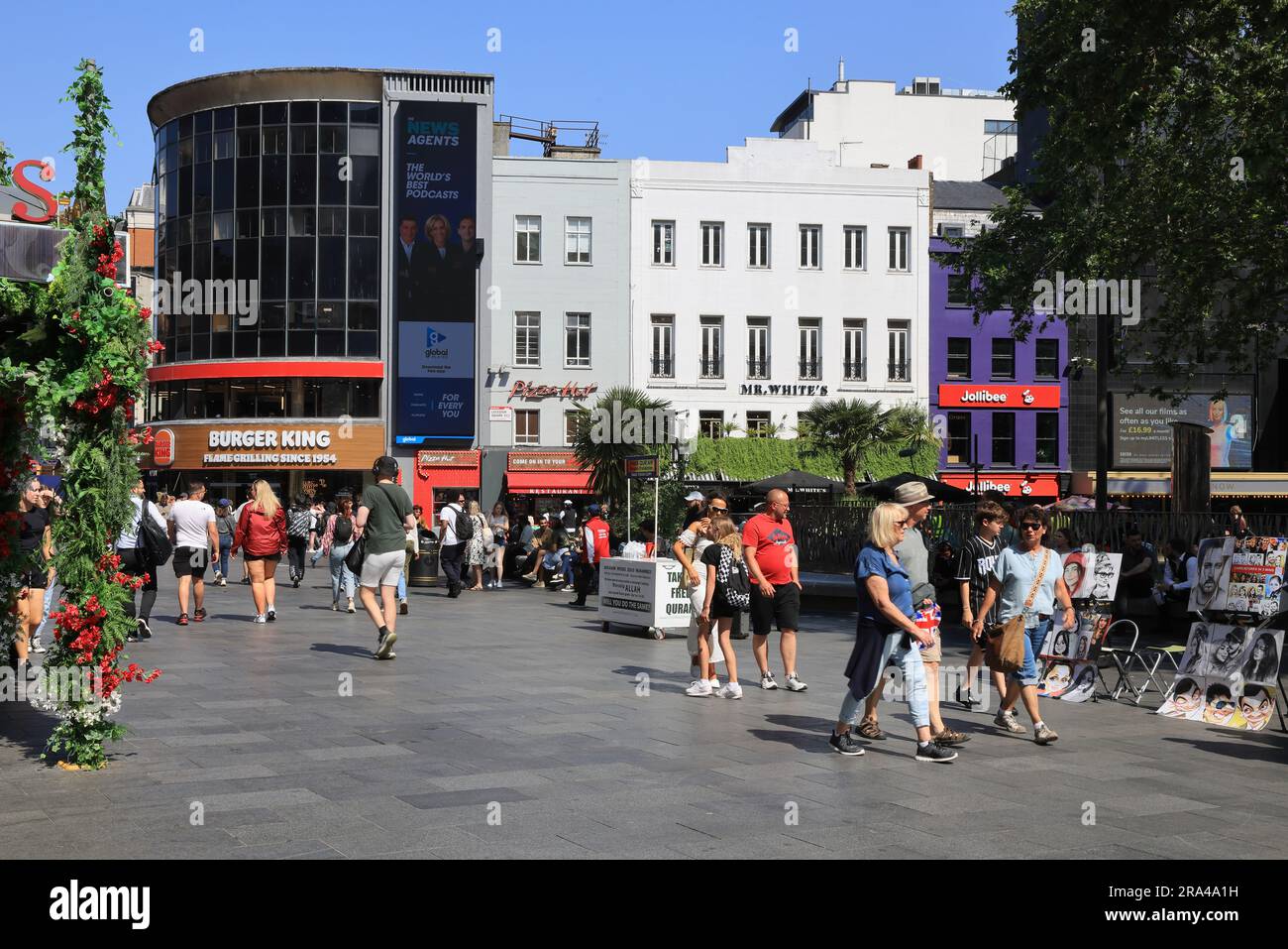 Leicester Square, home of film & entertainment, a pedestrianised square ...