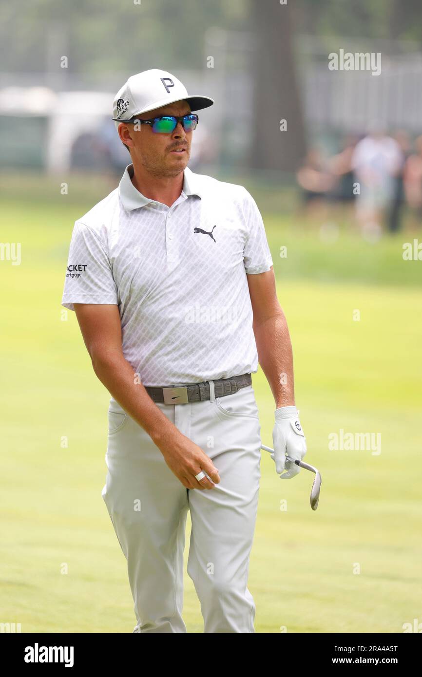 DETROIT, MI - JUNE 30: PGA golfer Rickie Fowler carries his water bottle on the first hole on ...