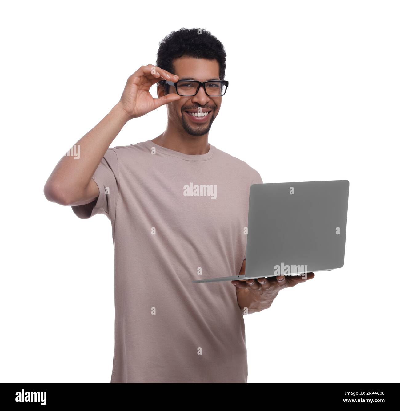 Happy man with laptop on white background Stock Photo - Alamy