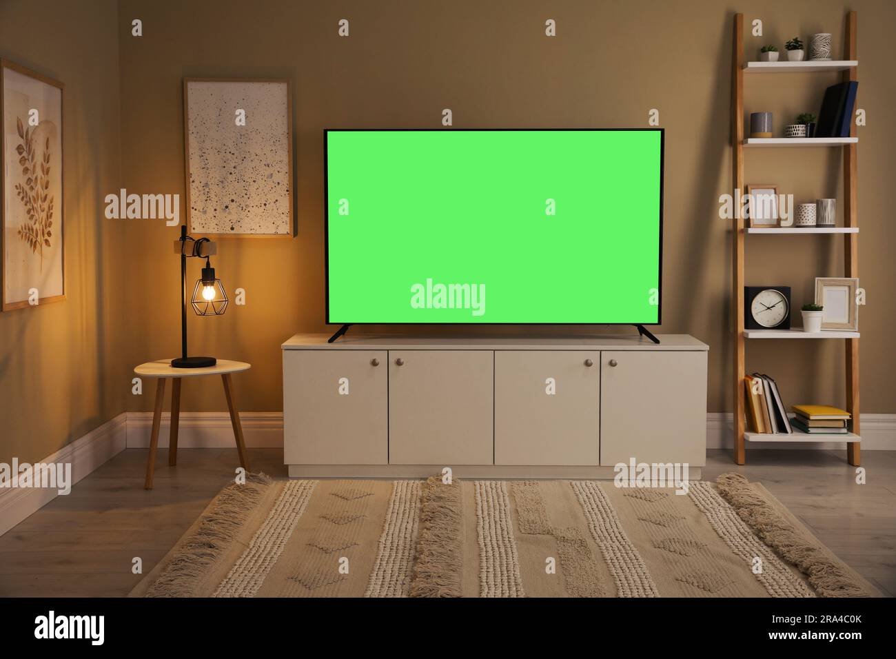 Chroma key compositing. TV with mockup green screen in room. Mockup for ...