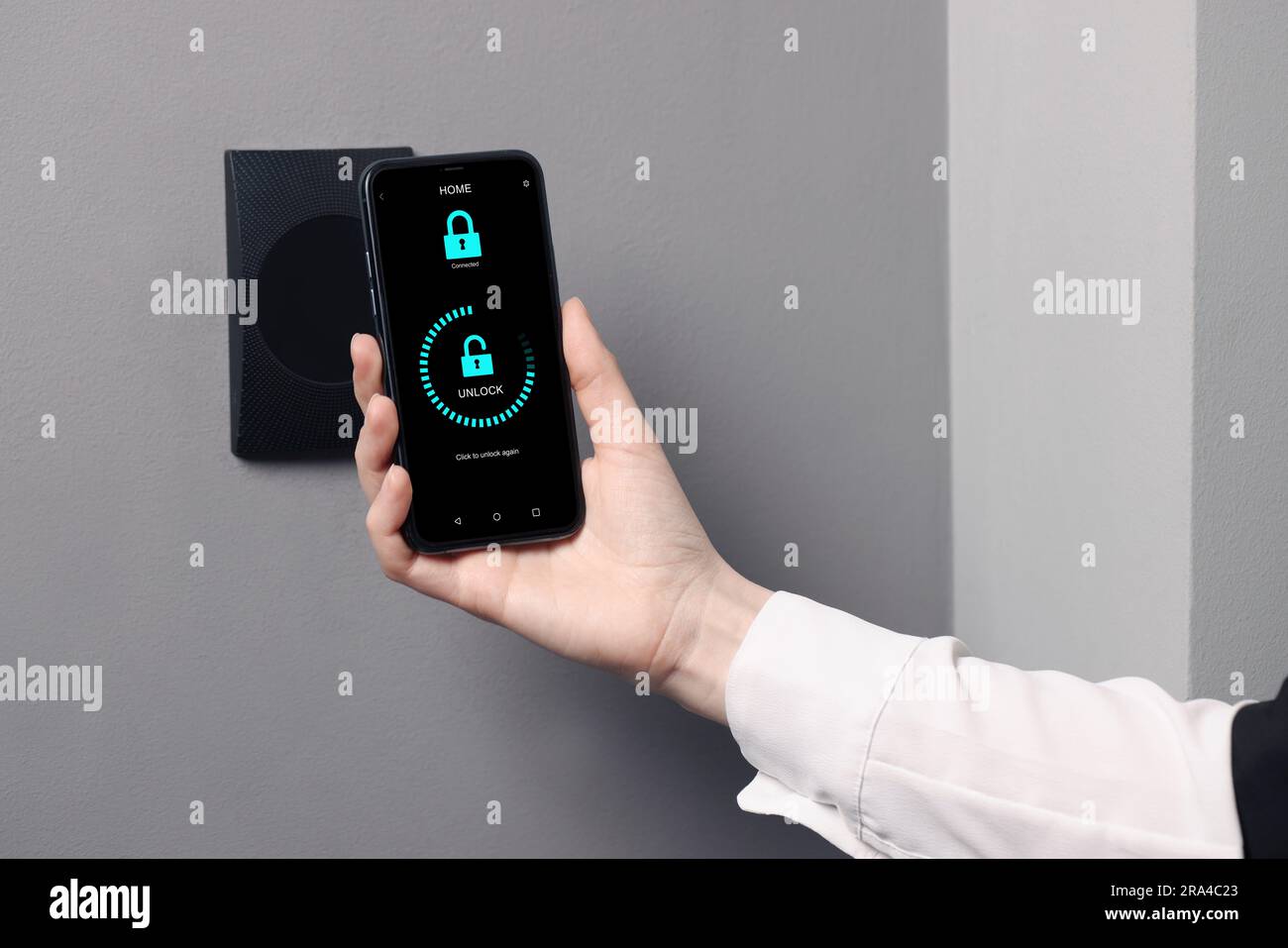 Woman unlocking door using mobile phone, closeup. Illustration of ...