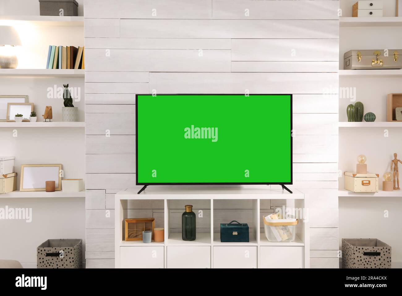 Chroma key compositing. TV with mockup green screen in room. Mockup for ...