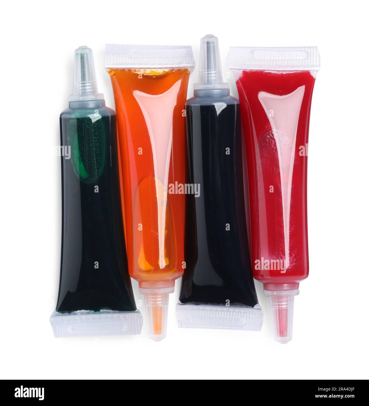 Tubes with different food coloring on white background, top view Stock ...