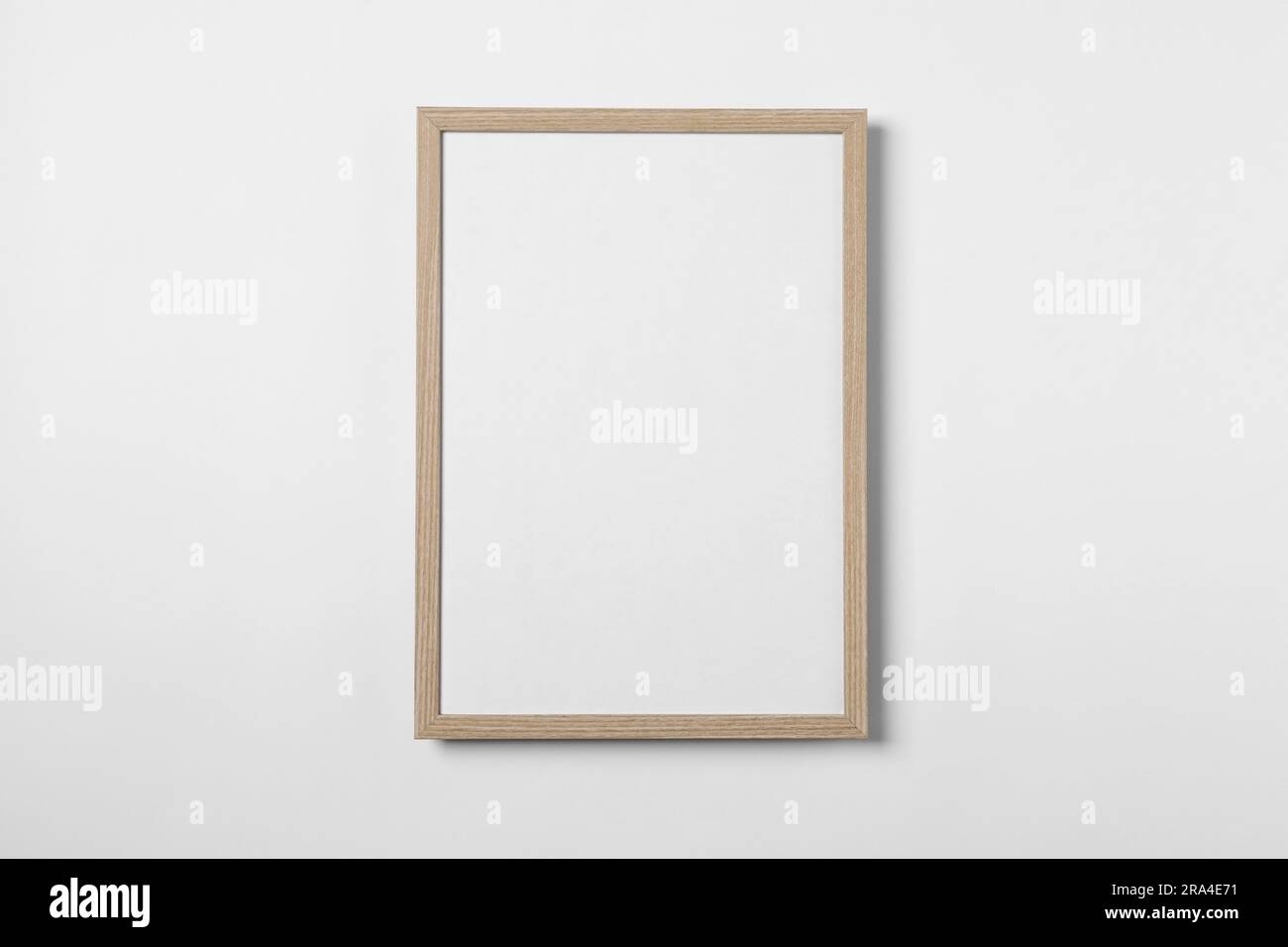 Empty wooden frame on white background. Mockup for design Stock Photo ...
