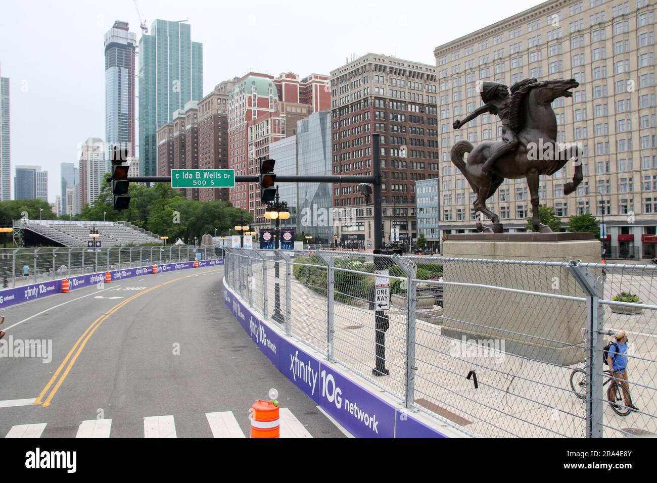 Protective fencing can be seen along a portion of the race track a day ...