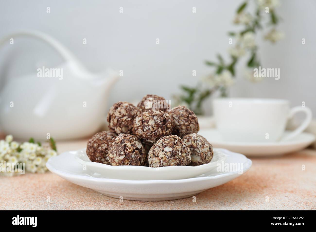 Delicious sweet chocolate candies on beige table Stock Photo - Alamy