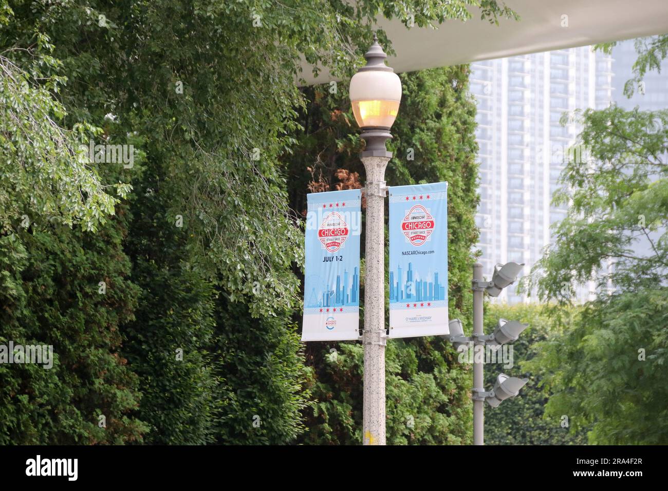 Banners promoting the NASCAR Chicago Street Race Weekend are hung in ...